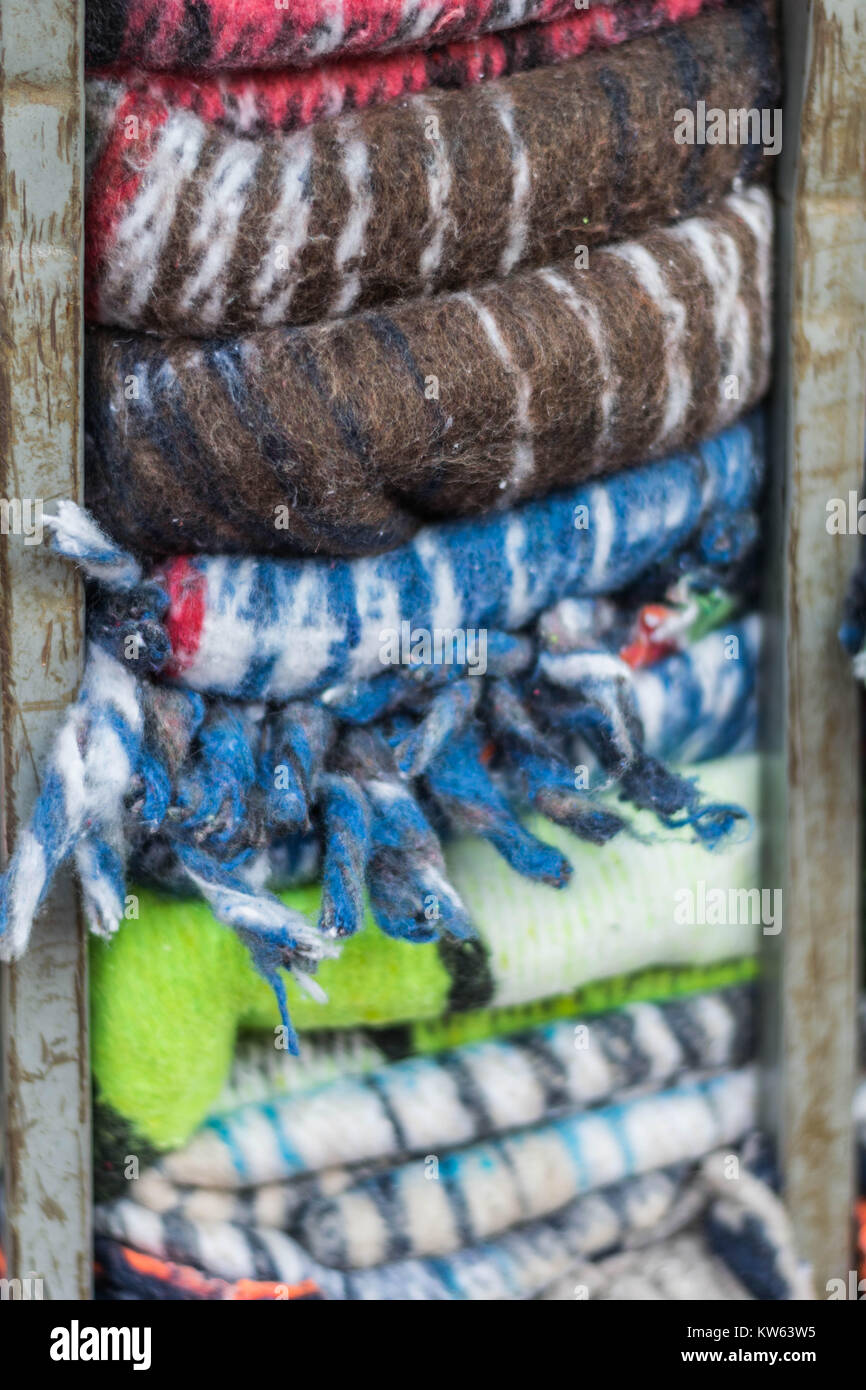 Stacks of folded colorful woven blankets, isolated and up-close, in San ...