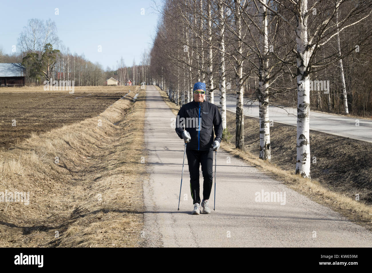 Nordic walking in countryside Stock Photo - Alamy