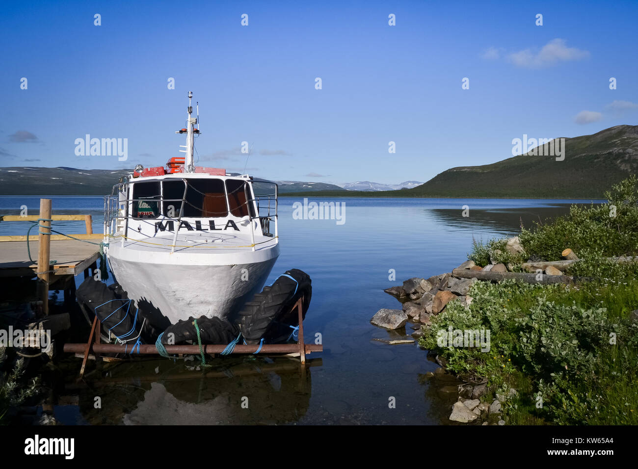 Malla boat by the lake in summer in Kilpisjärvi Stock Photo - Alamy