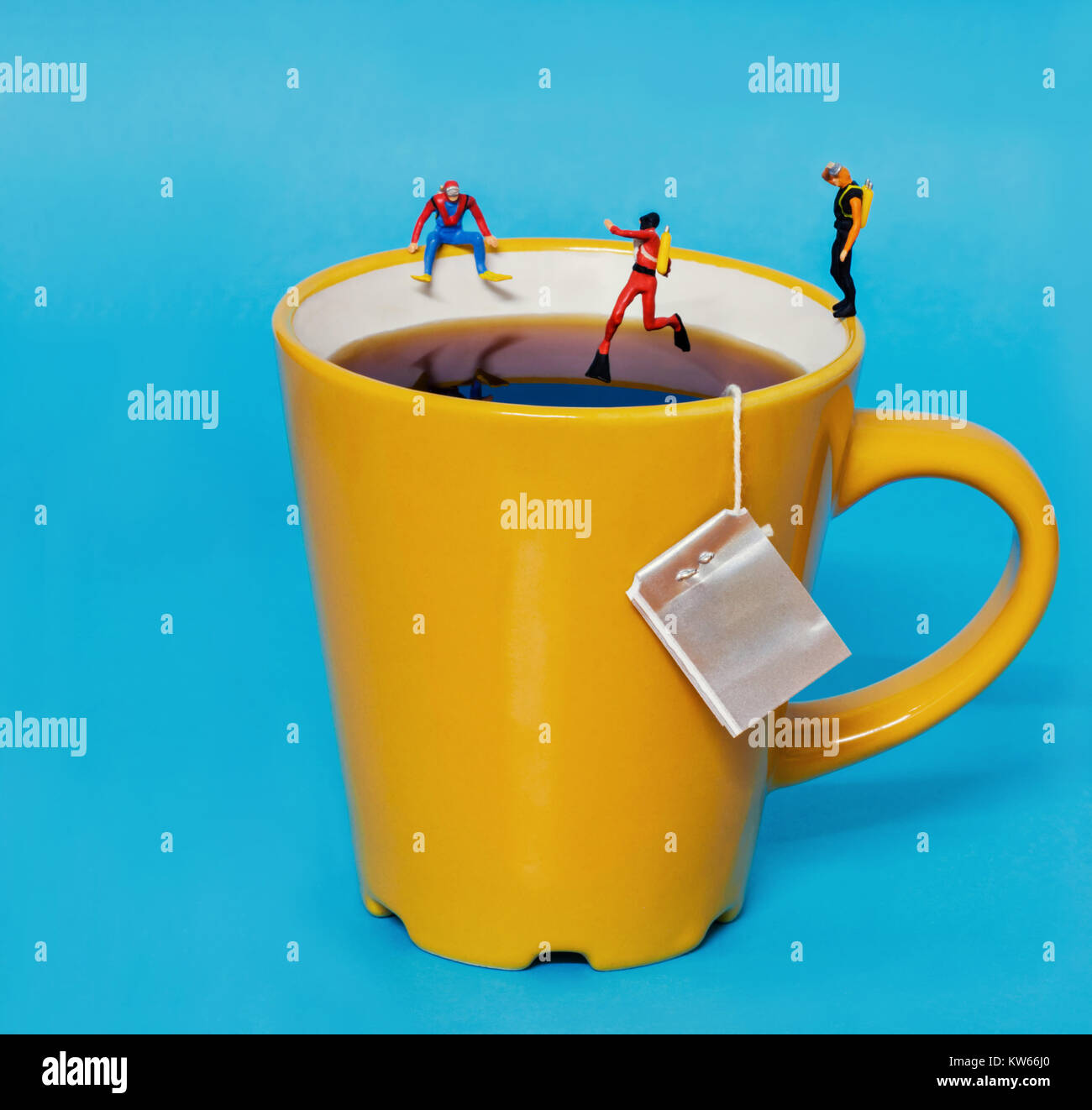 conceptual diver jumping in a tea cup Stock Photo - Alamy