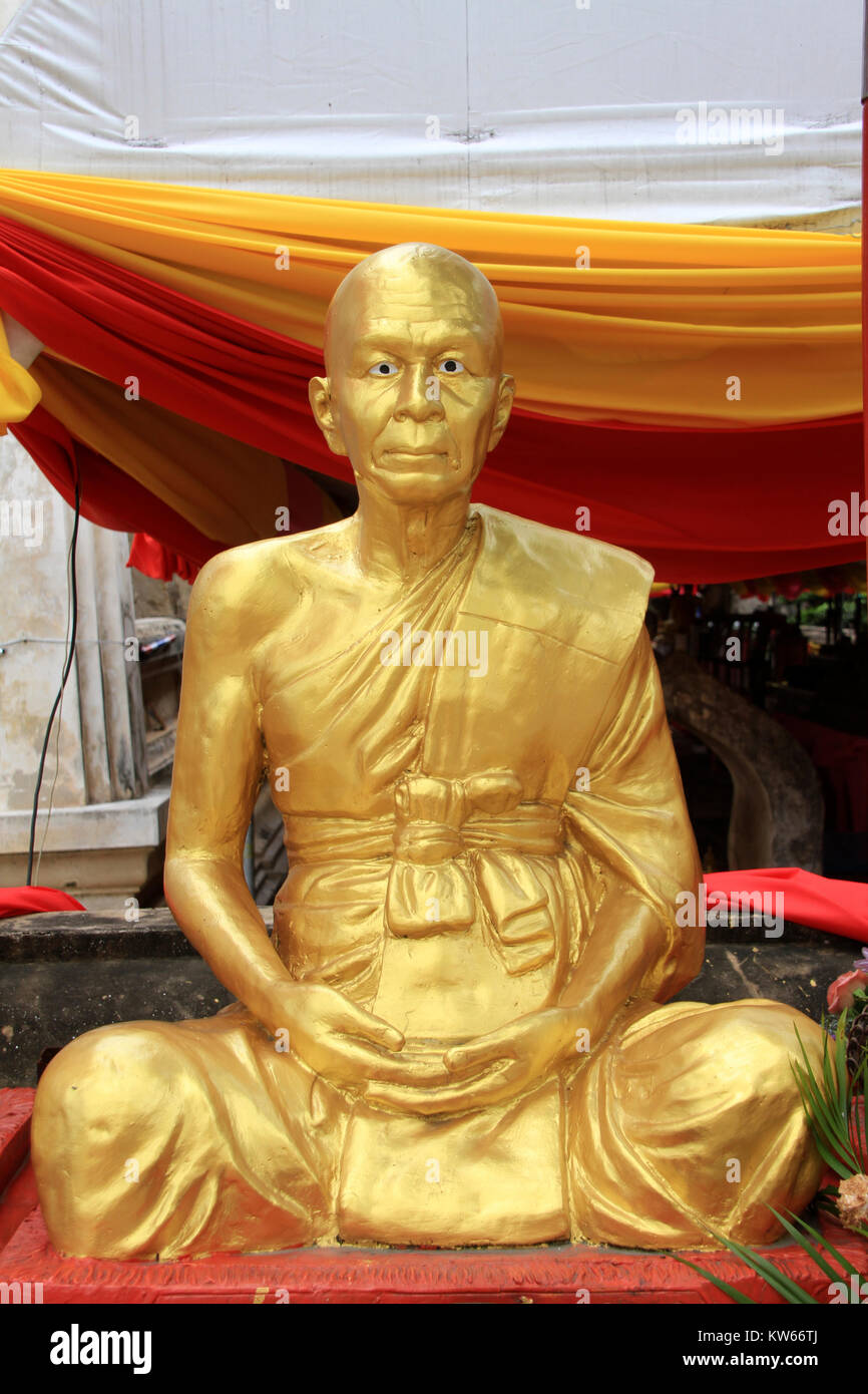 Golden monk near temple in Wat Takarong in Ayutthaya, Thailand Stock ...