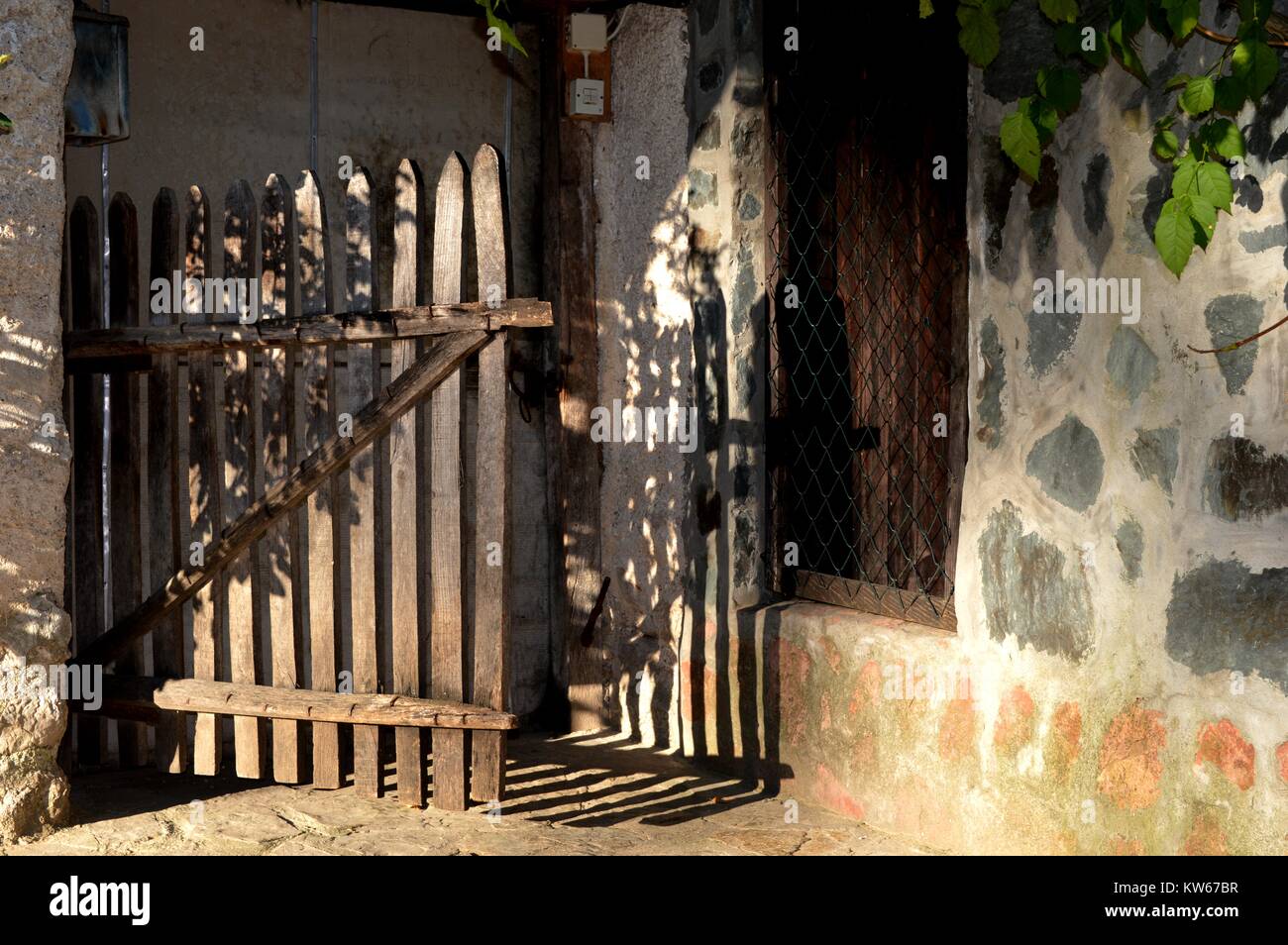 wooden gate and shadow Stock Photo - Alamy