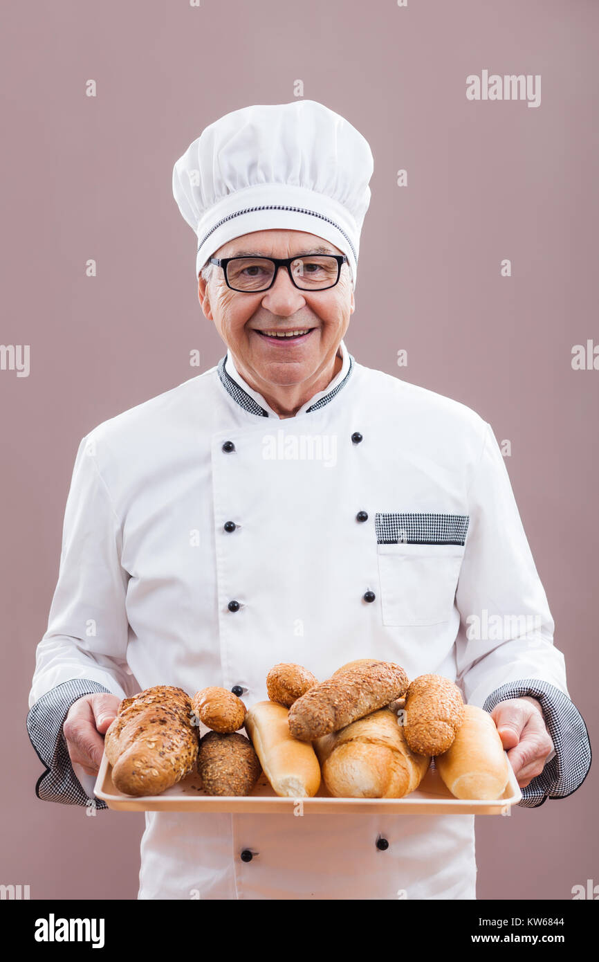 Portrait of happy baker chef in working uniform Stock Photo - Alamy