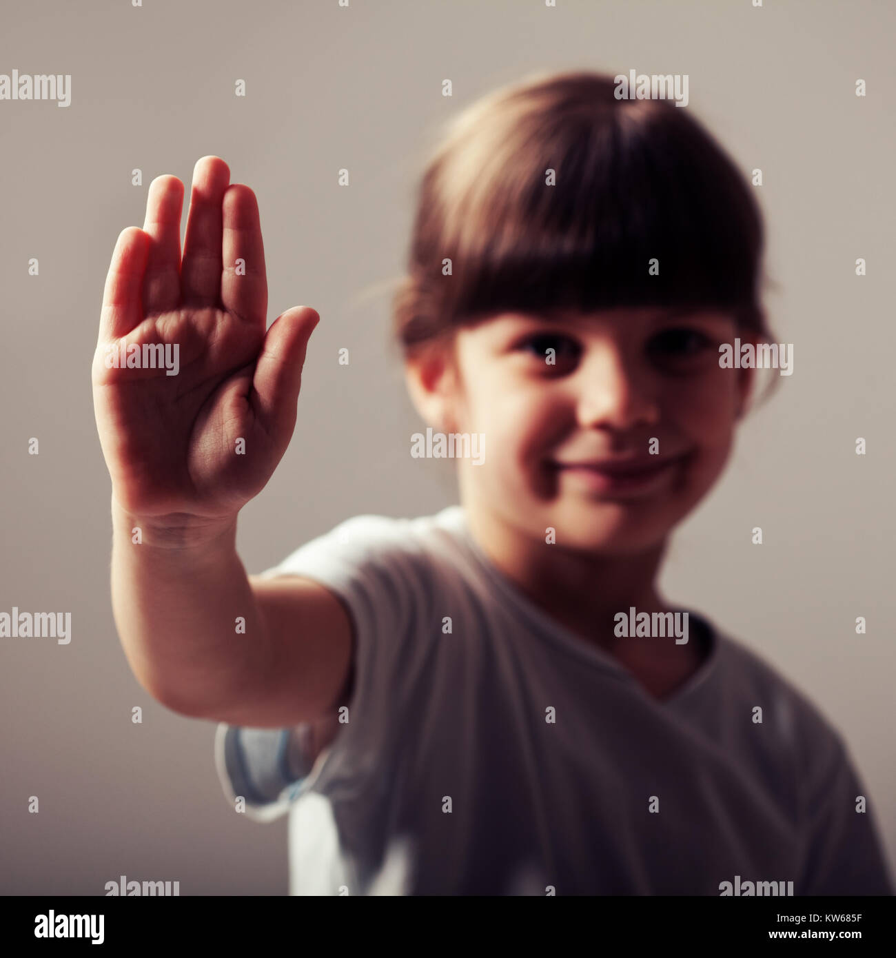 Child showing stop sign Stock Photo - Alamy
