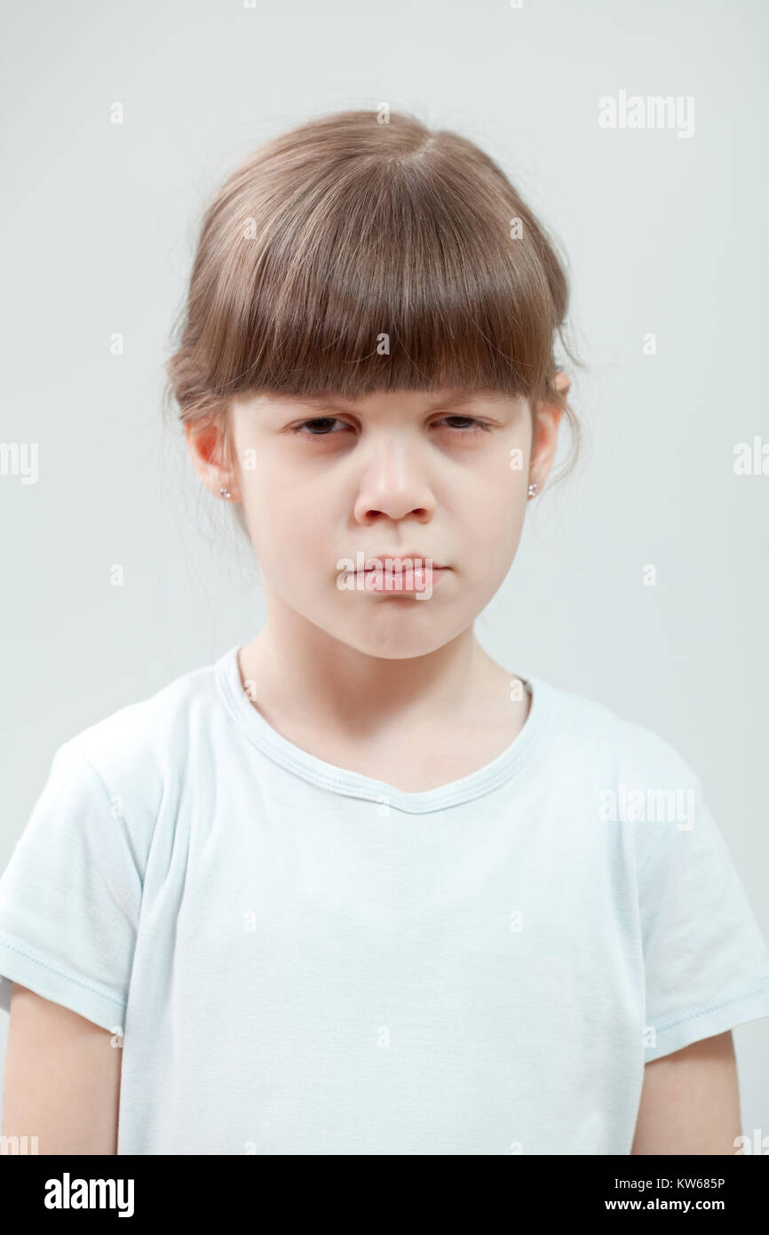 Portrait of displeased child Stock Photo - Alamy