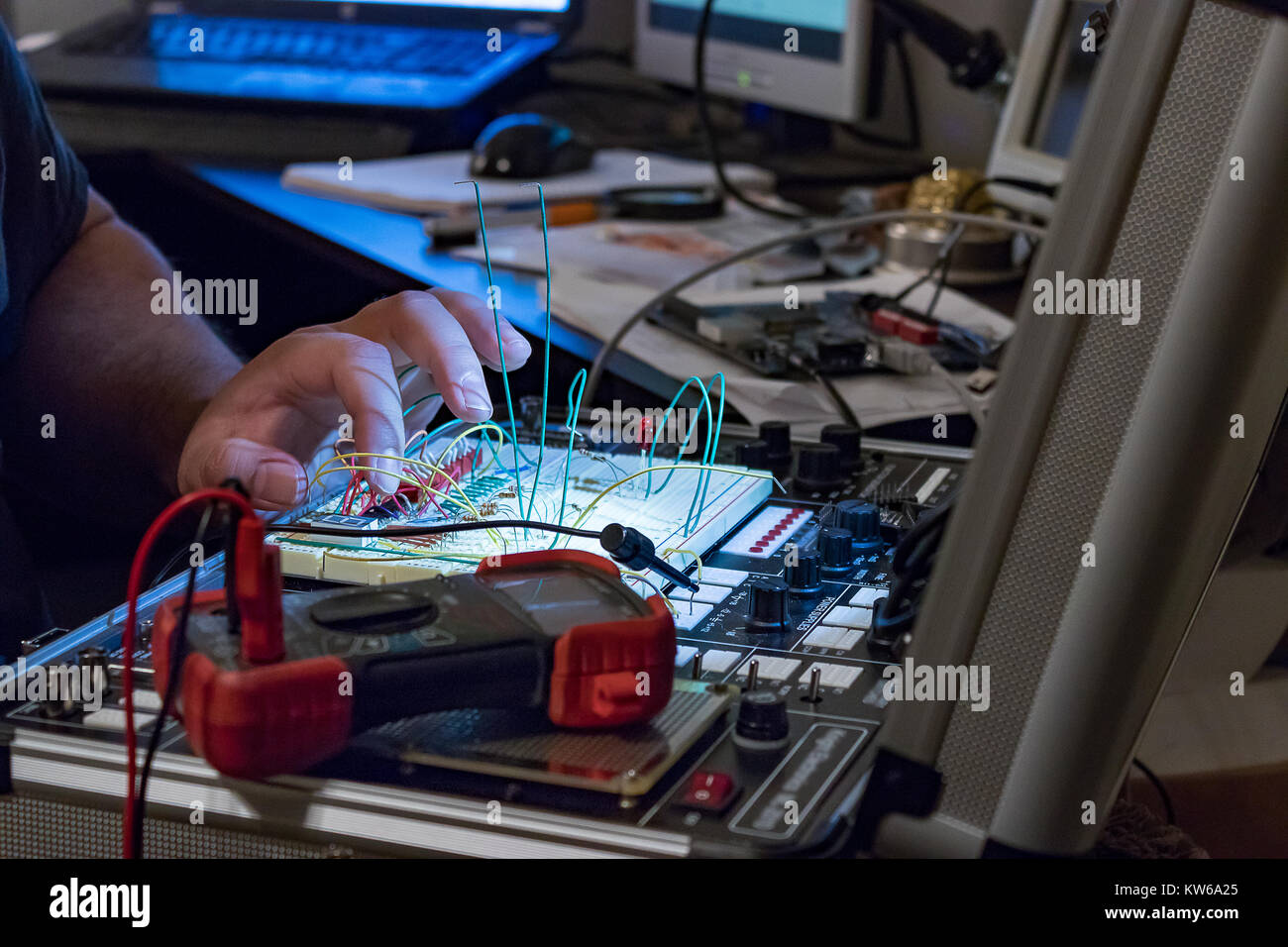 hands on electronics hardware Stock Photo - Alamy