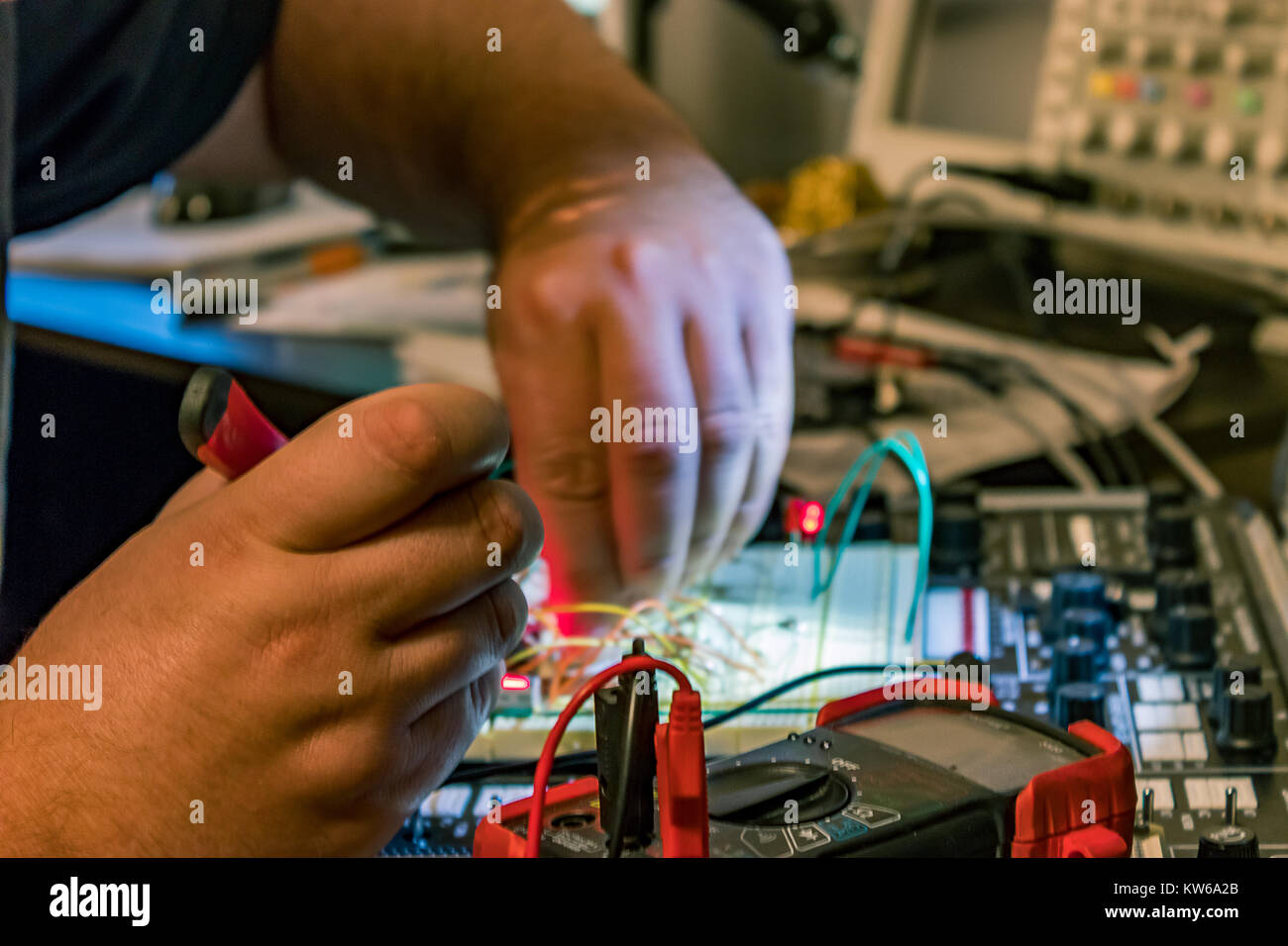 working with electronics and wires Stock Photo - Alamy