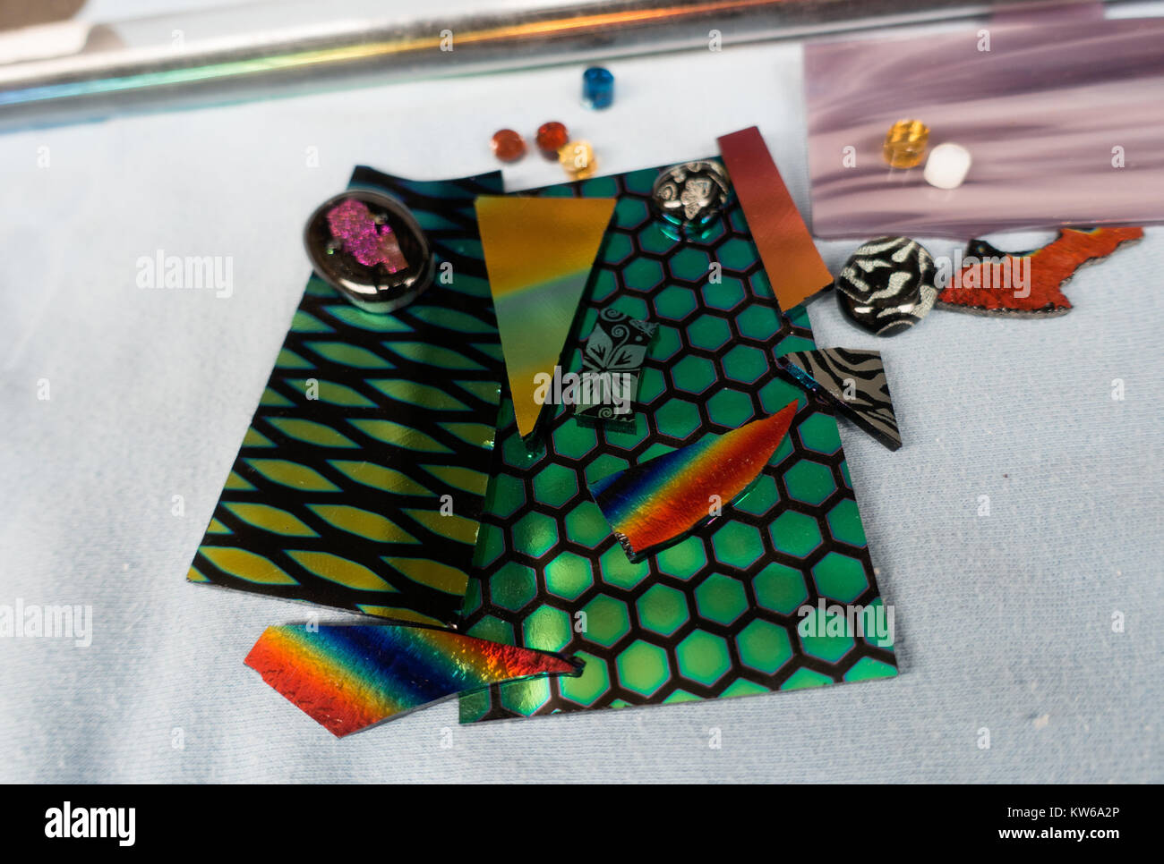 Assorted pieces of Dichroic Glass for fusing Stock Photo - Alamy
