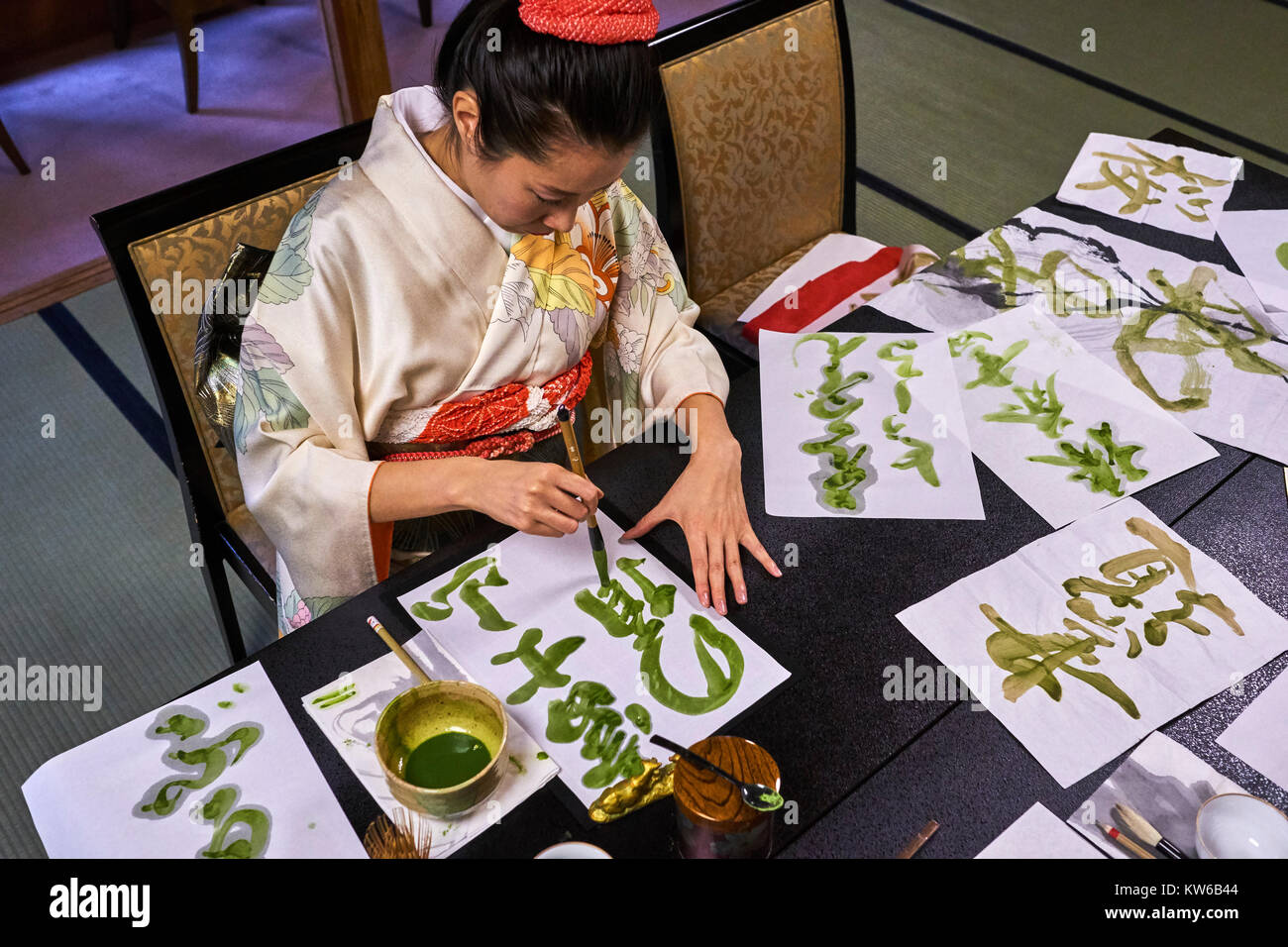 Japan, Honshu, Shizuoka region, Shizuoka, Matcha green tea calligraphy ...