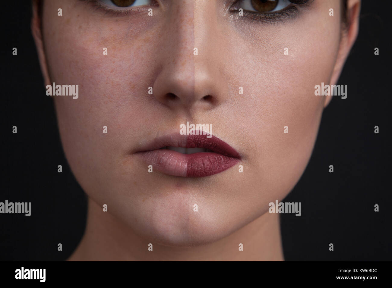 Woman with make-up on one side of the face and without make-up on the ...