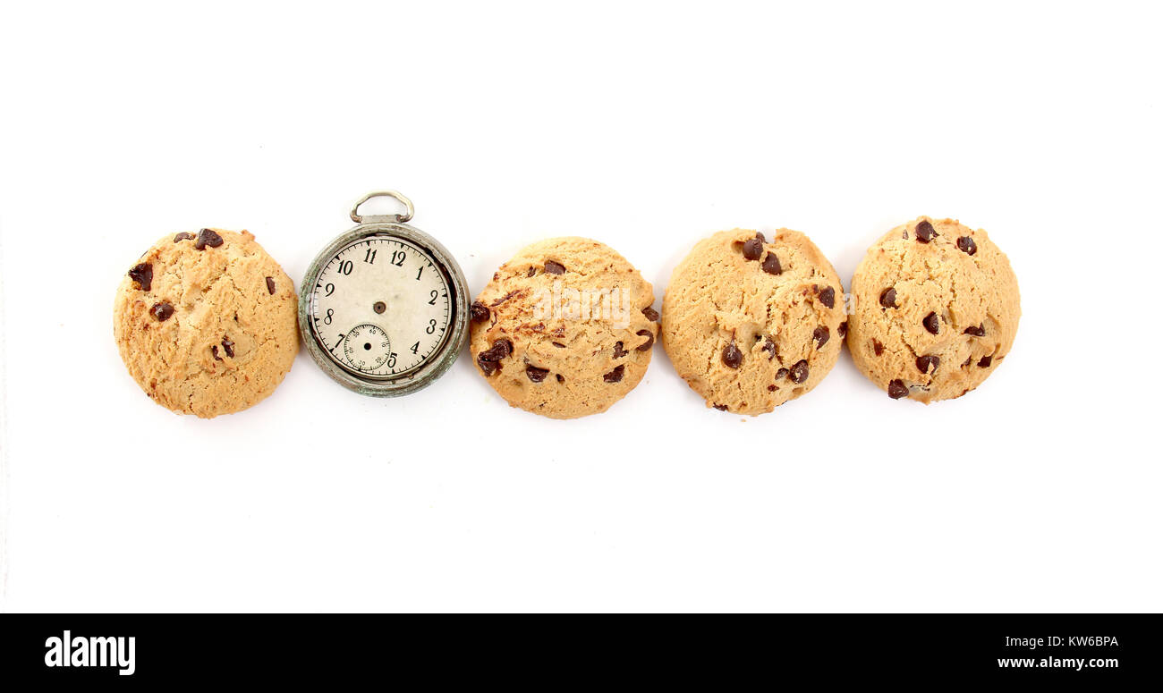 Chocolate Chip Cookies and vimtage clock isolated on white background ...