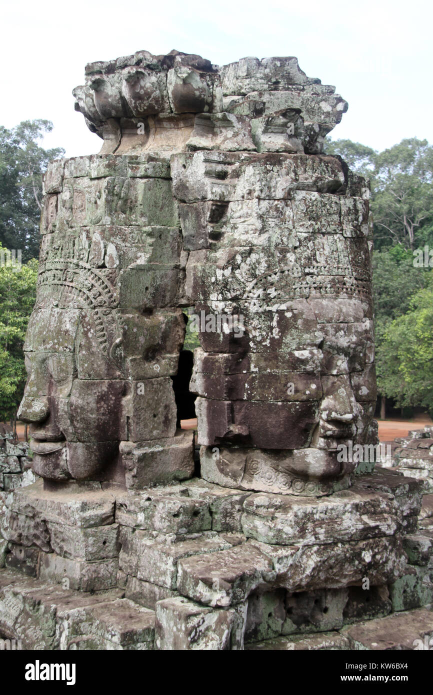 Two god's heads in temple Bayon, Angkor, Cambodia Stock Photo - Alamy