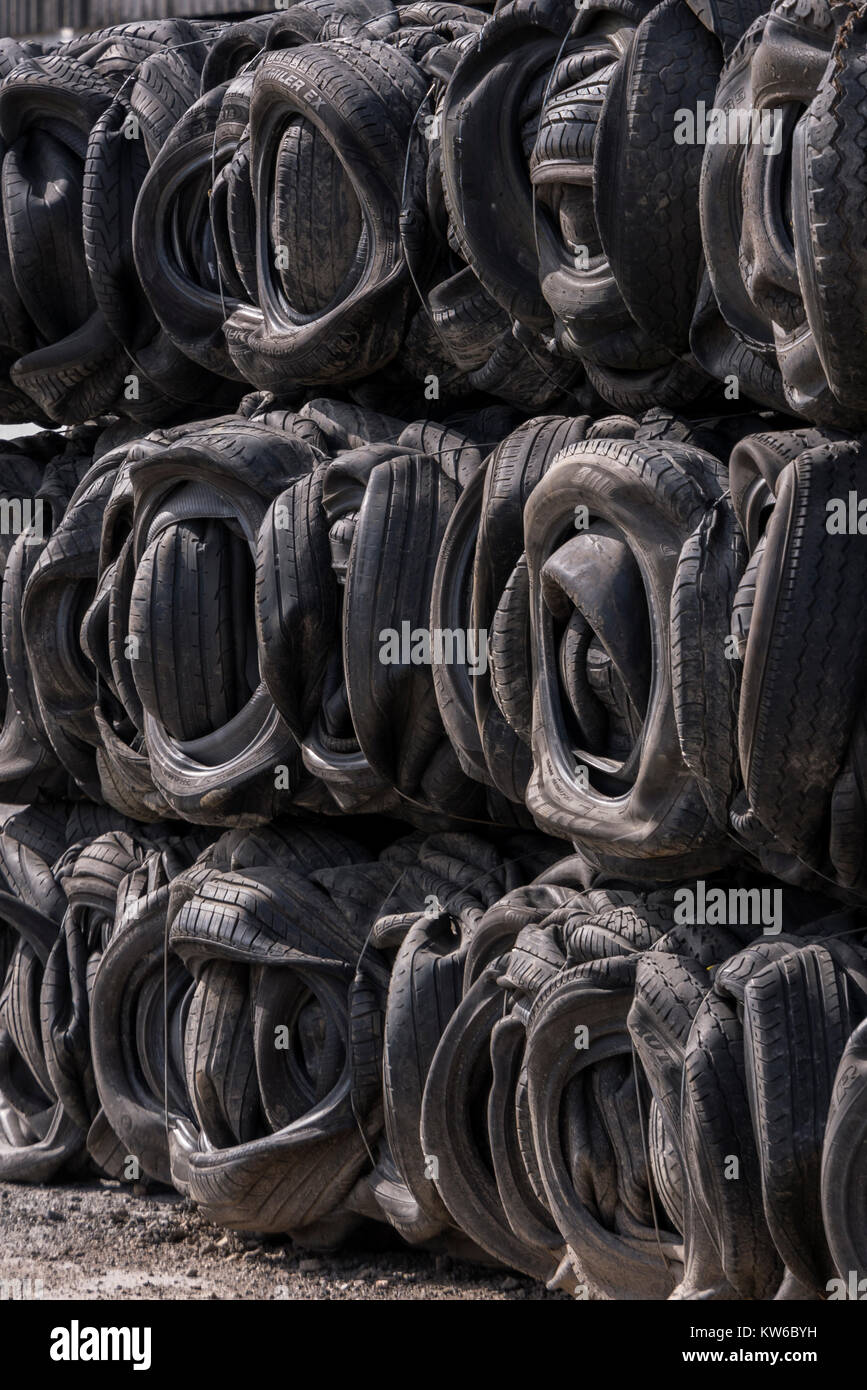 Bale of worn vehicle tryes ready for recycling Stock Photo - Alamy