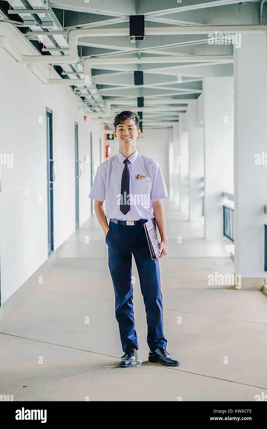 Male and female students in school uniform hi-res stock photography and ...
