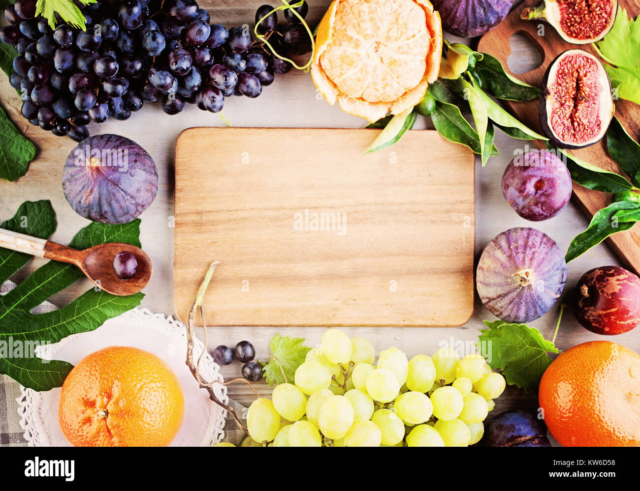 Healthy Eating Background with Organic Fruits and Brown Wooden Board ...