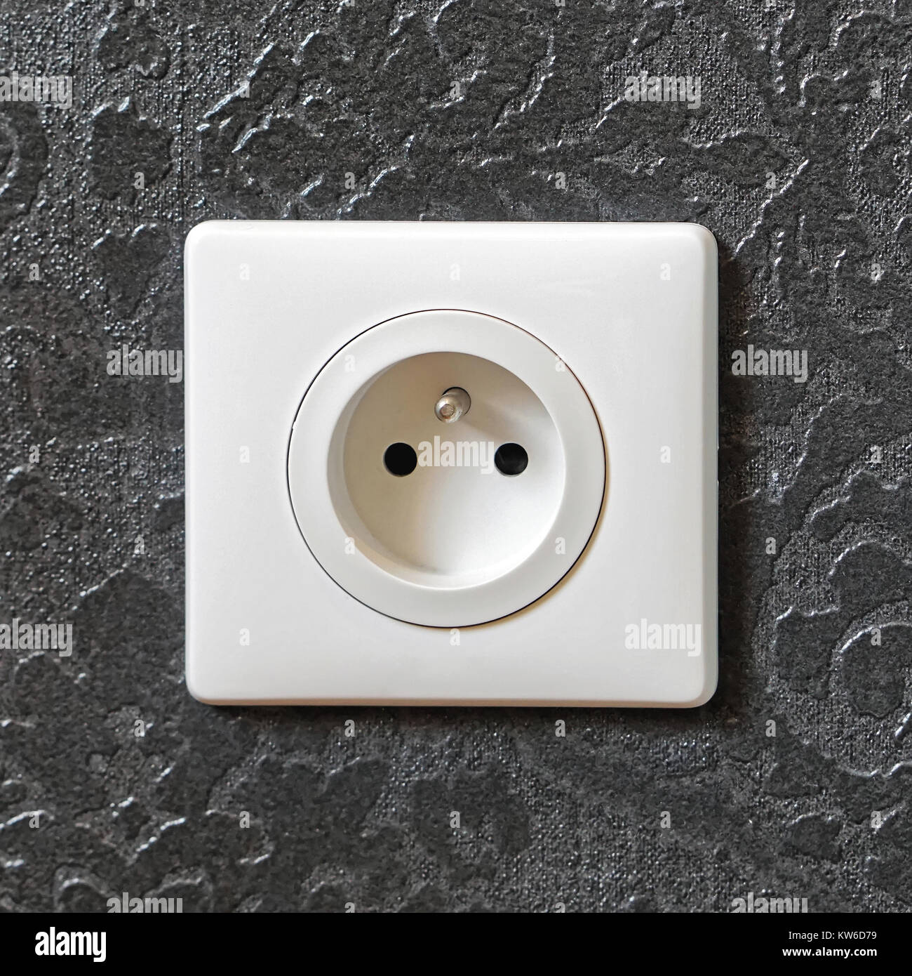 Electric socket with ground in France Stock Photo - Alamy
