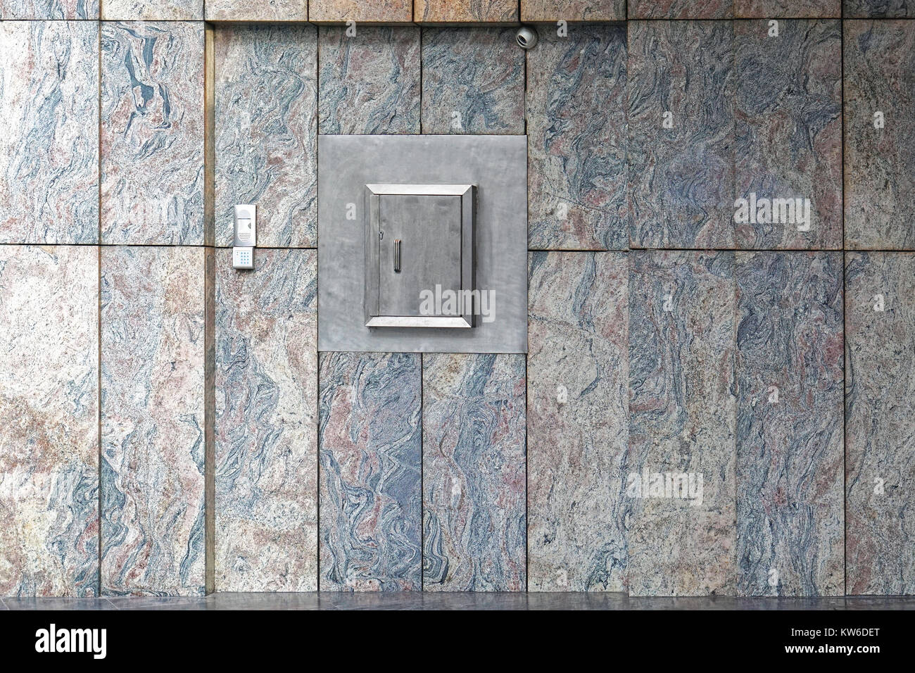 Night safe deposit at bank wall Stock Photo - Alamy