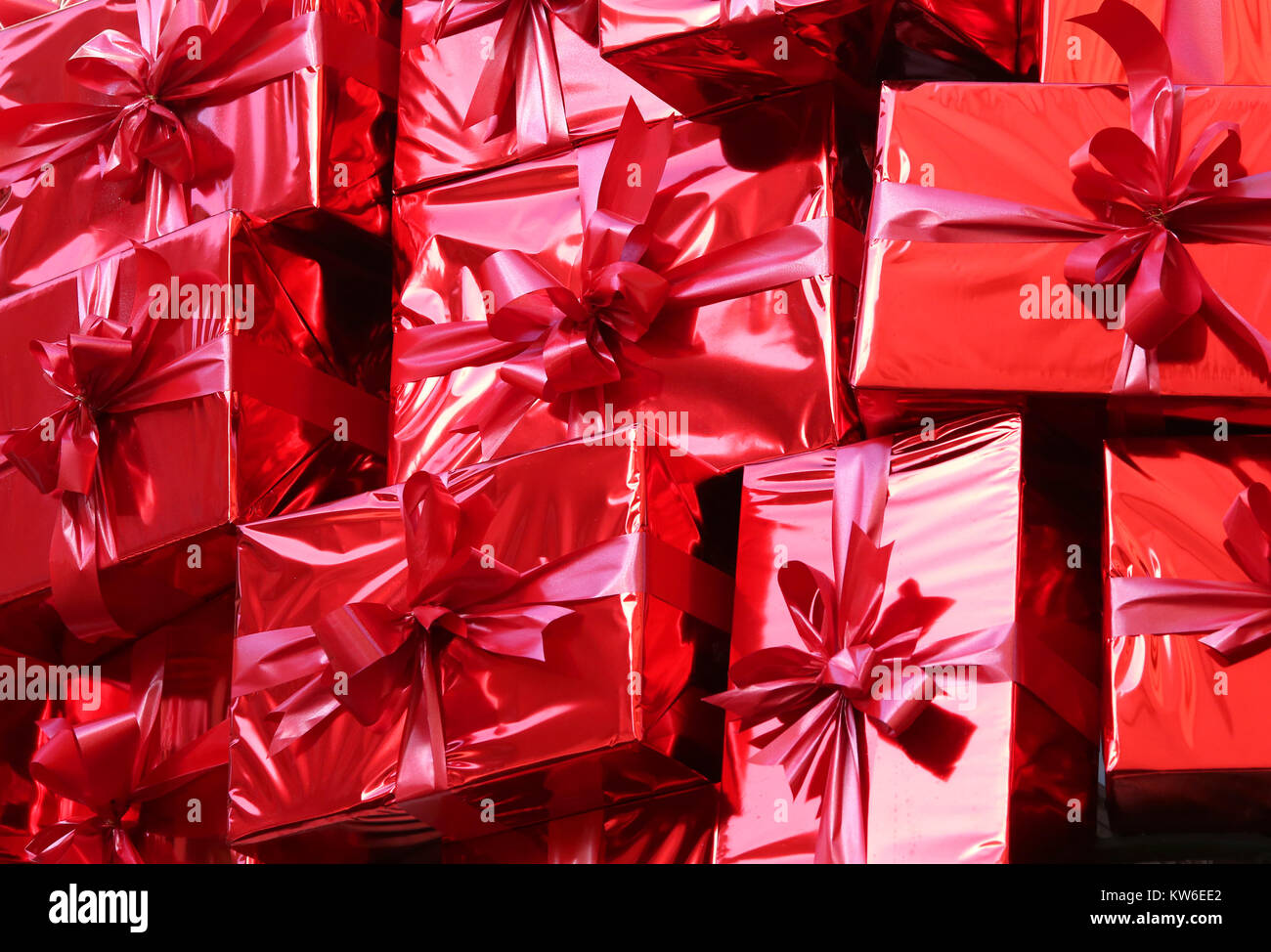 background of many red gifts to christmas Stock Photo - Alamy