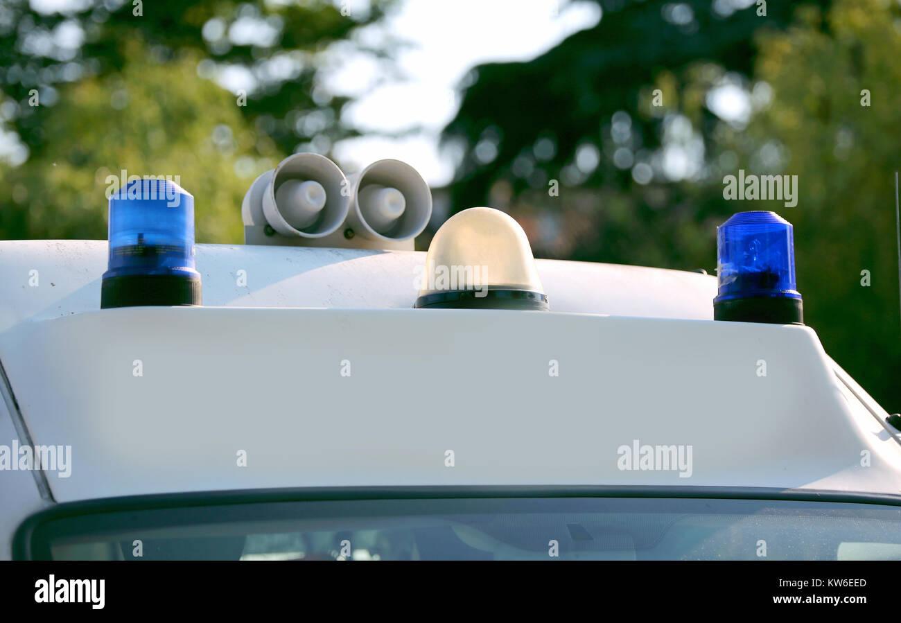 blue lights of a white ambulance vehicle during an emergency Stock ...