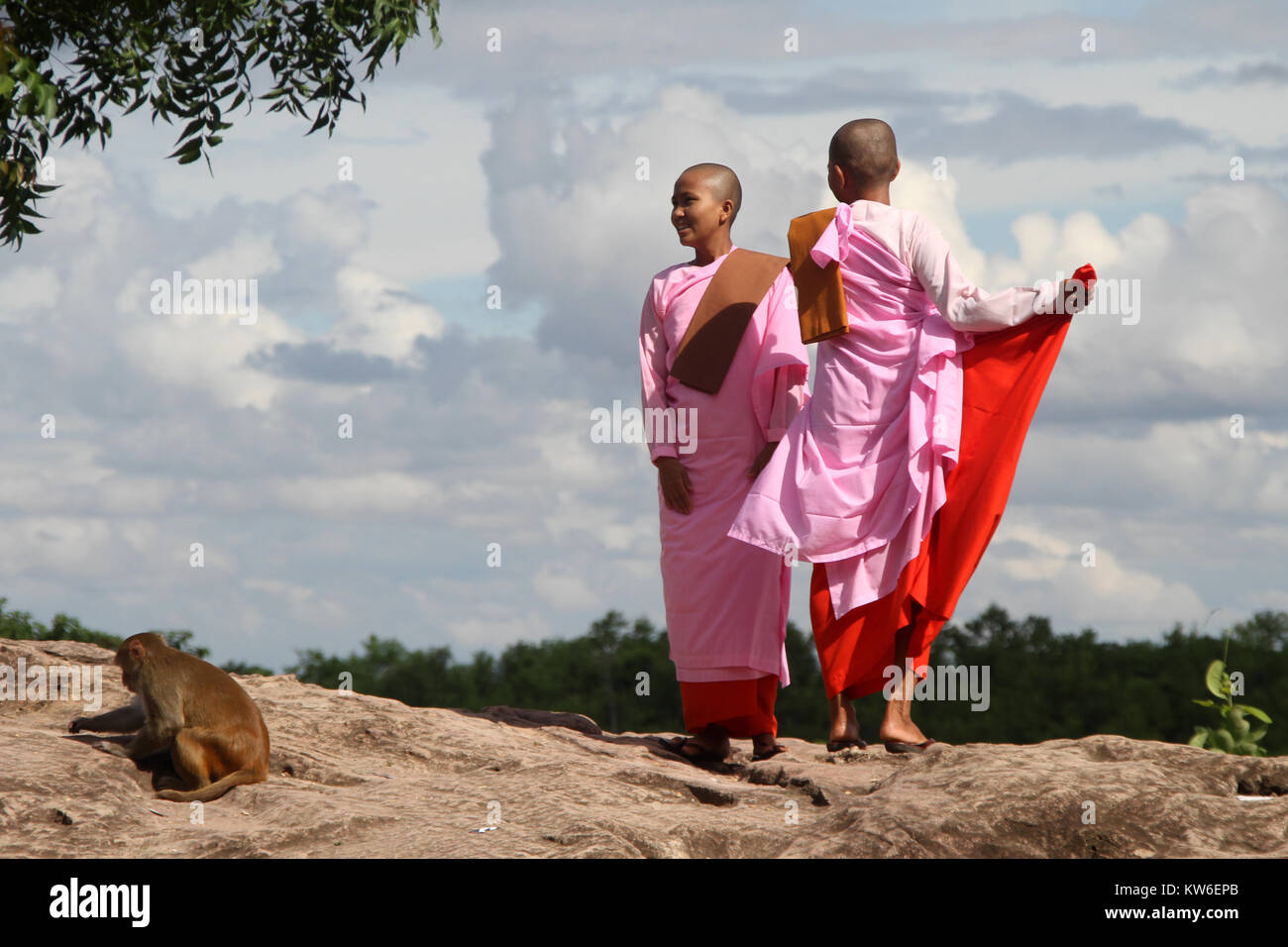 Two buddhist women monk on the rock near Hpo Win Daung Caves, Moniwa ...