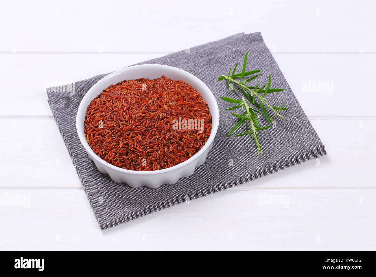 bowl of red rice on grey place mat Stock Photo - Alamy