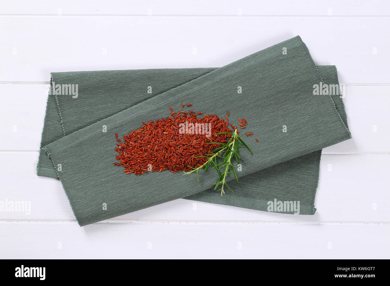 pile of red rice on grey place mat Stock Photo - Alamy