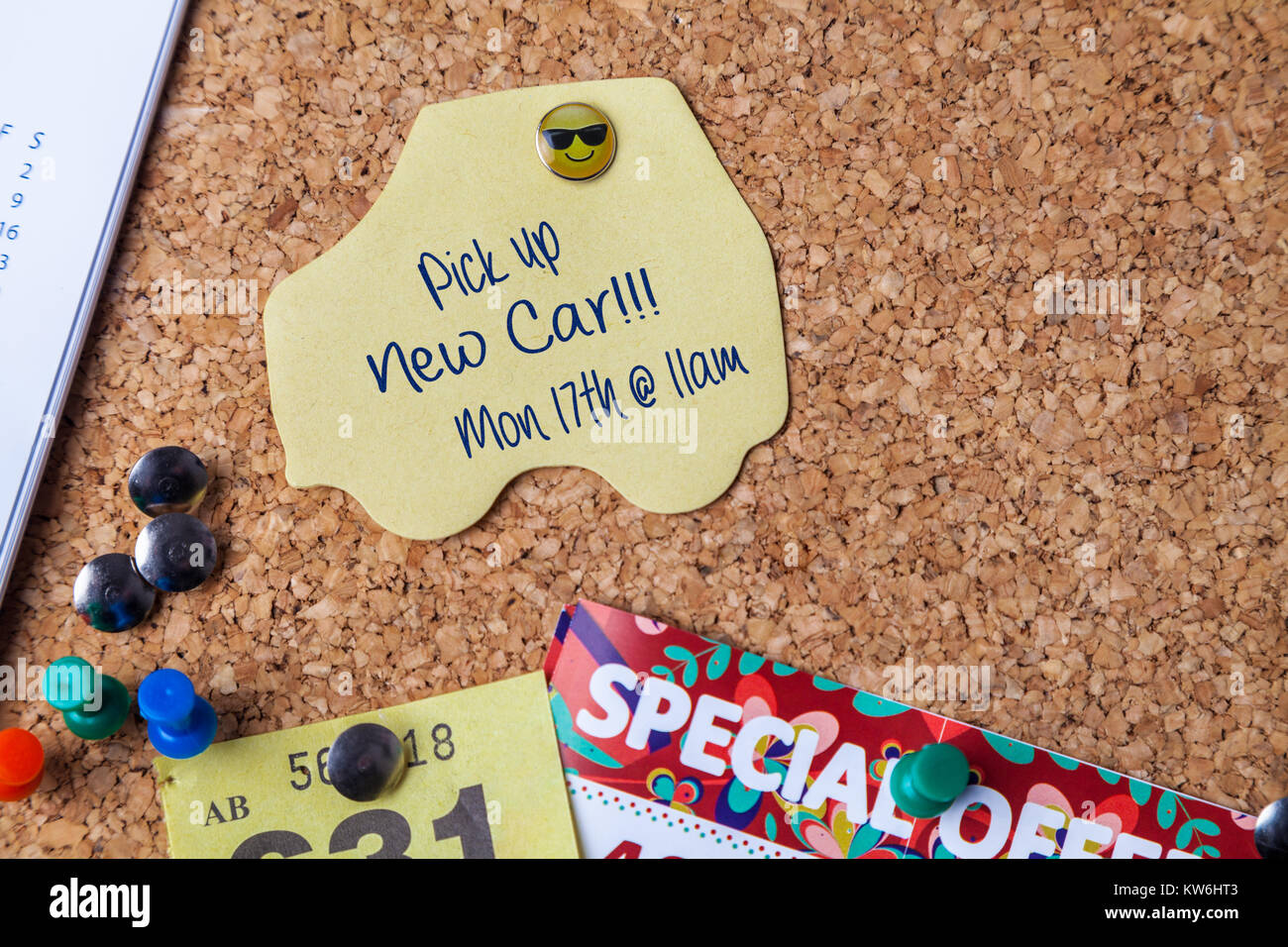 Car shaped Note on cork notice board for new car Stock Photo - Alamy