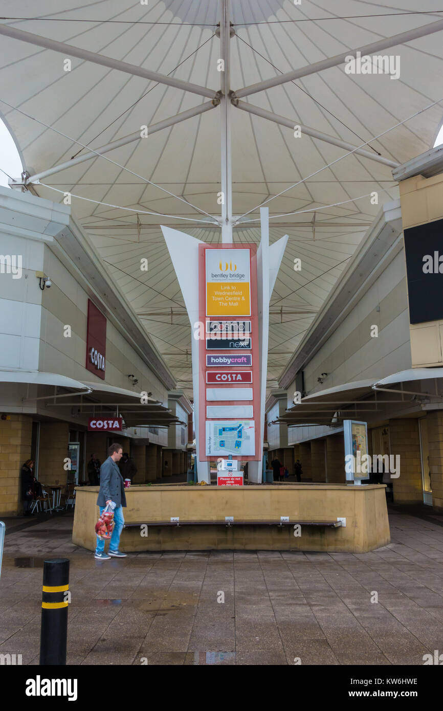 A sign at Bentely Bridge Retail Park in Wolverhampton in The UK acts a ...
