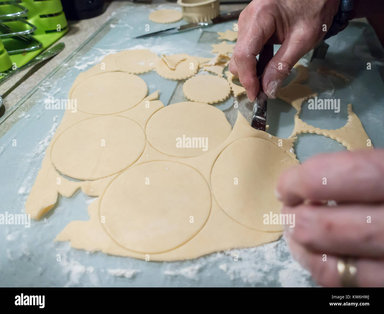 Making Mince Pies: Cutting shapes out of rolled shortcrust pastry on a ...