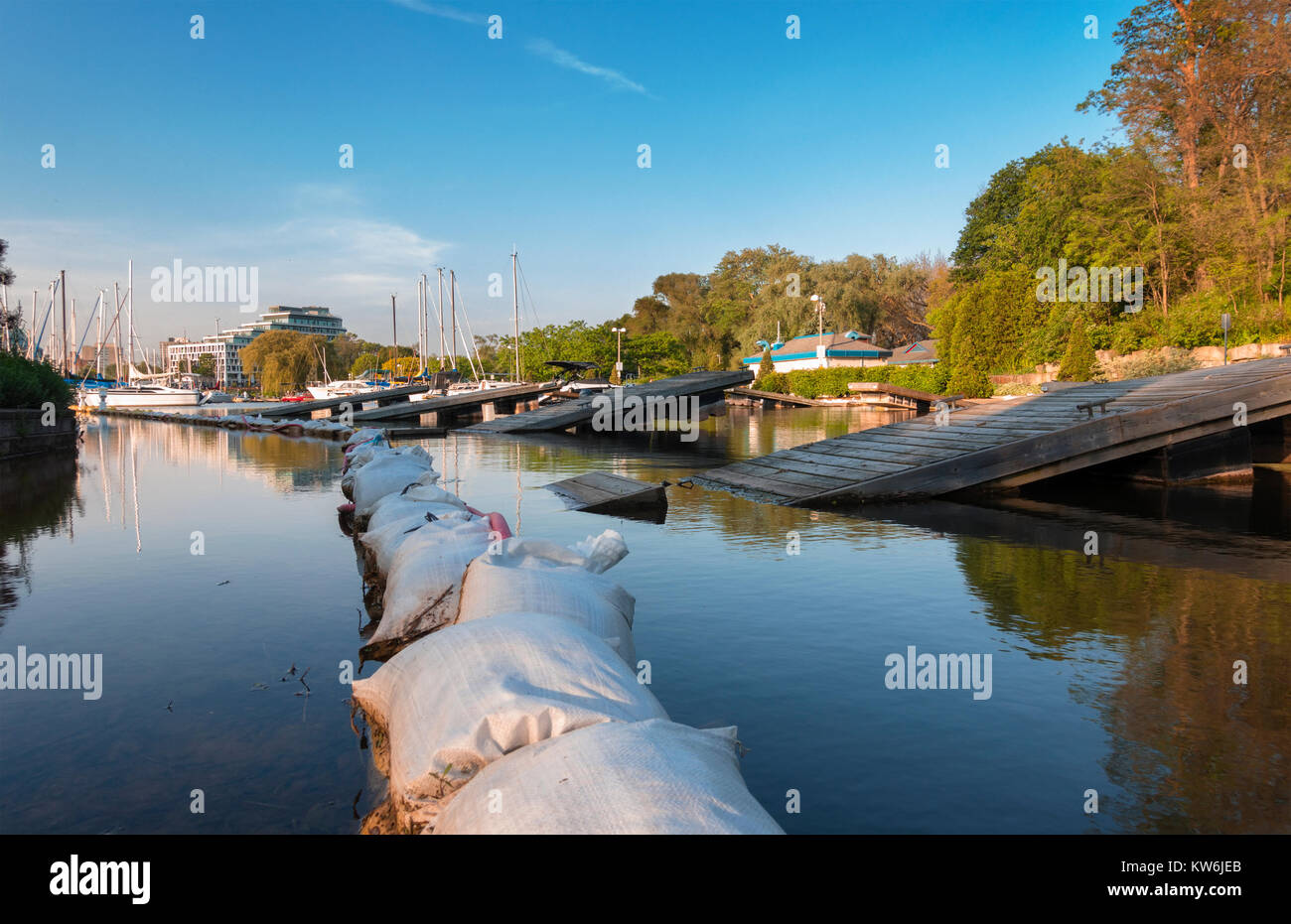 A flooded Bronte creek near its outlet to Lake Ontario at Bronte Beach ...
