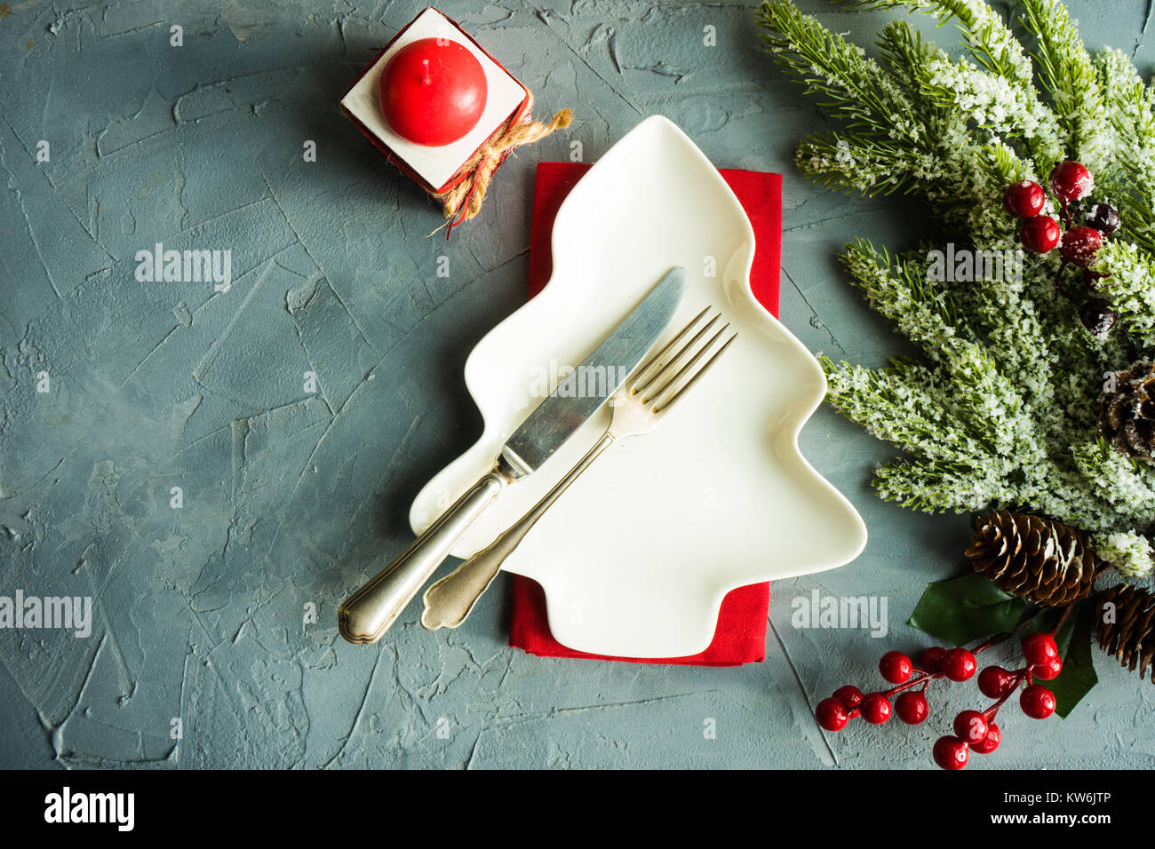 Rustic table setting for festive Christmas dinner with vintage decor on ...