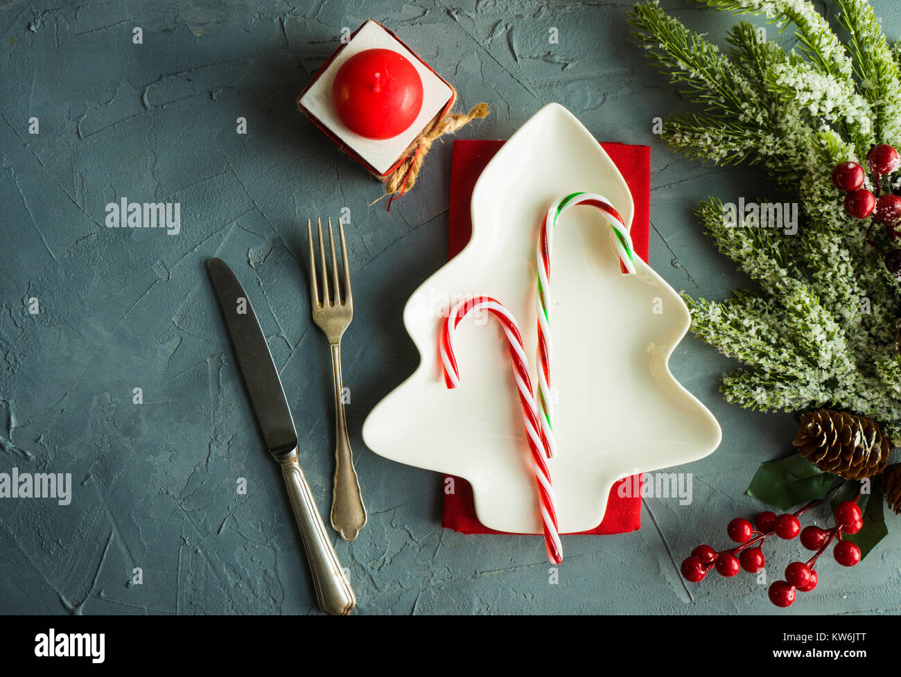 Rustic table setting for festive Christmas dinner with vintage decor on ...