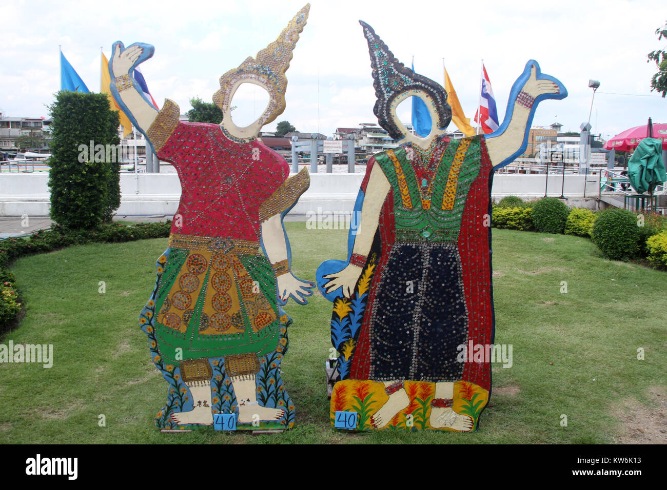 Color statues for photo tourist in Bangkok, Thailand Stock Photo - Alamy