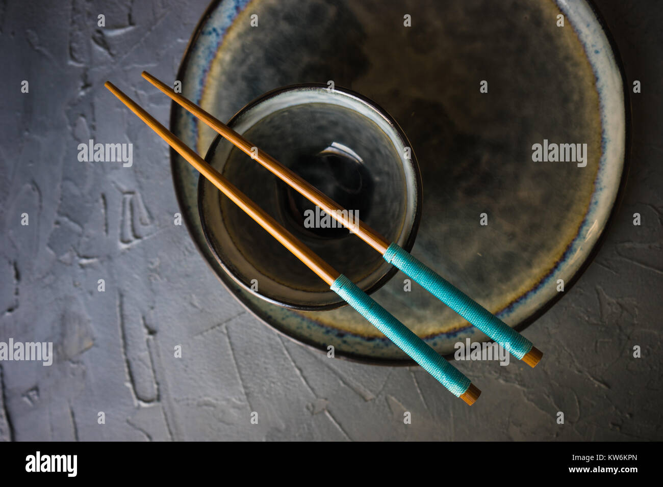 Table set with chopsticks for festive dinner in eastern style Stock ...