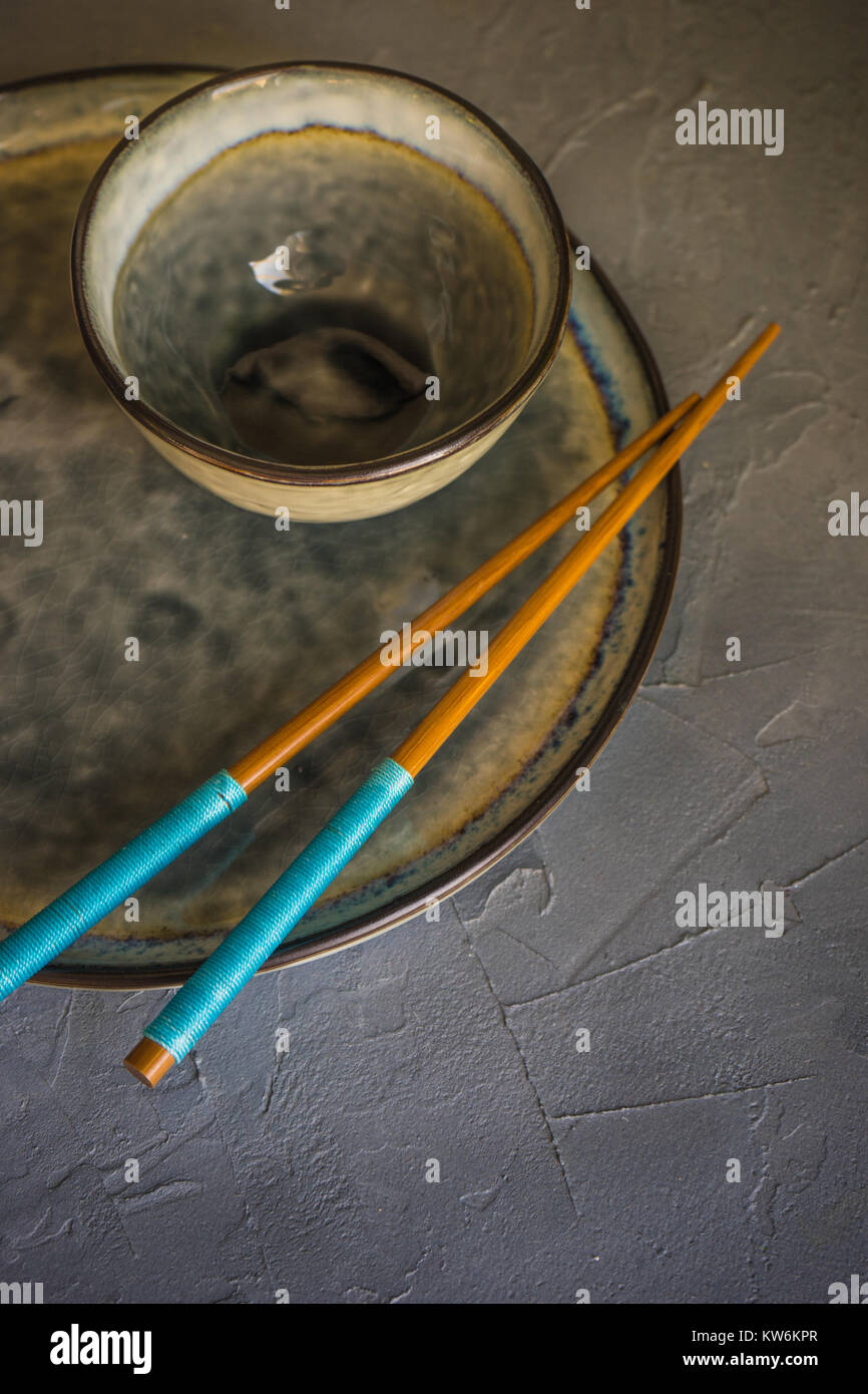 Table set with chopsticks for festive dinner in eastern style Stock ...