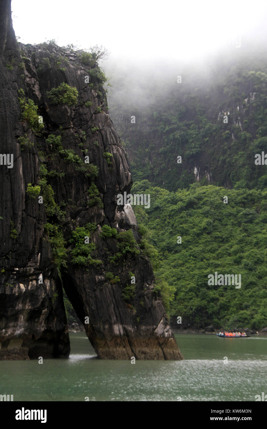 Rock and water in Halong bay, Vietnam Stock Photo - Alamy