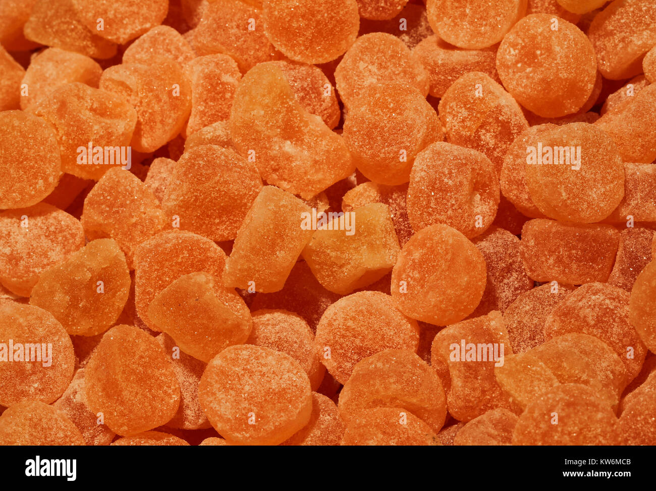 lots of sugary orange flavored candies Stock Photo - Alamy