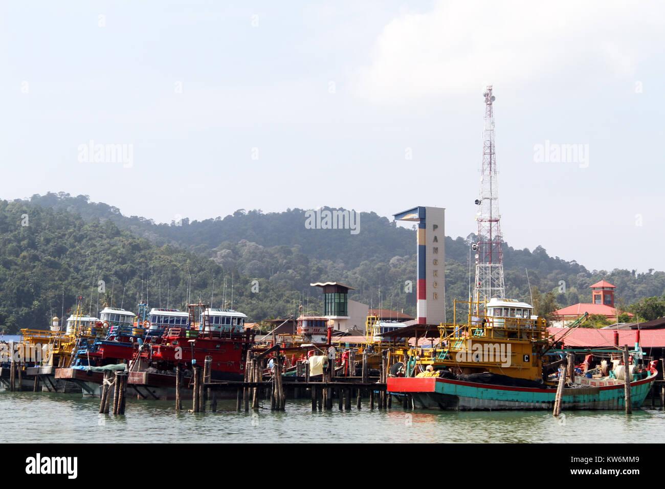 Boats near pier on the Pangkor island, Malaysia Stock Photo - Alamy