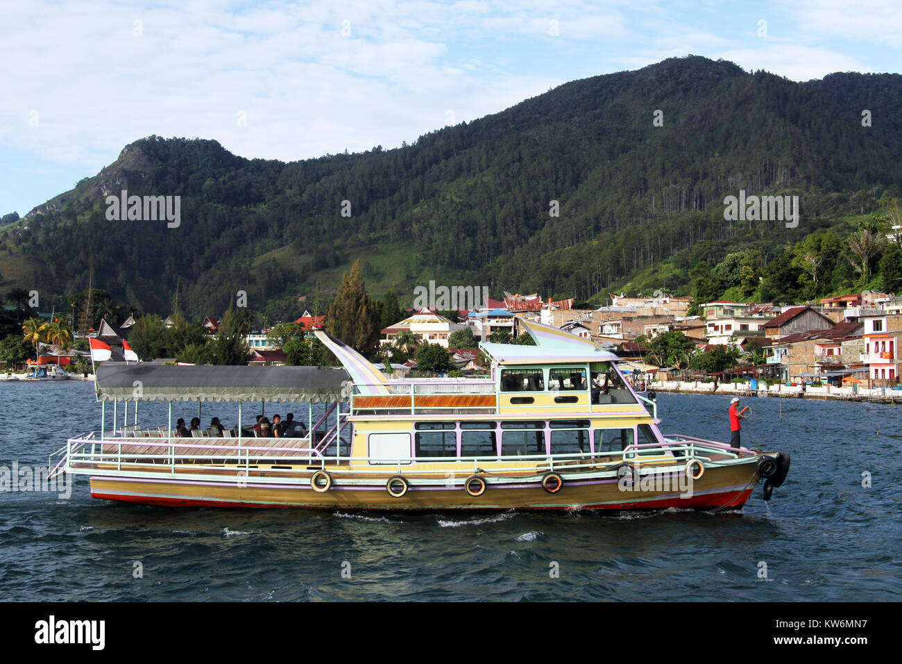 Ferry boat near pier in Parapat, Indonesia Stock Photo - Alamy
