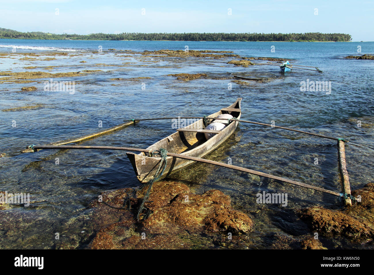 Traditional wooden boats on the water in Nias island, Indonesia Stock ...