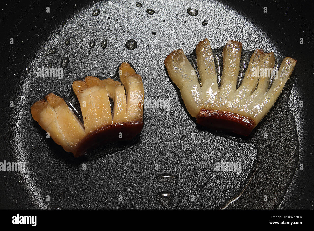 Melting fat - baking and cooking - grease bacon Stock Photo - Alamy