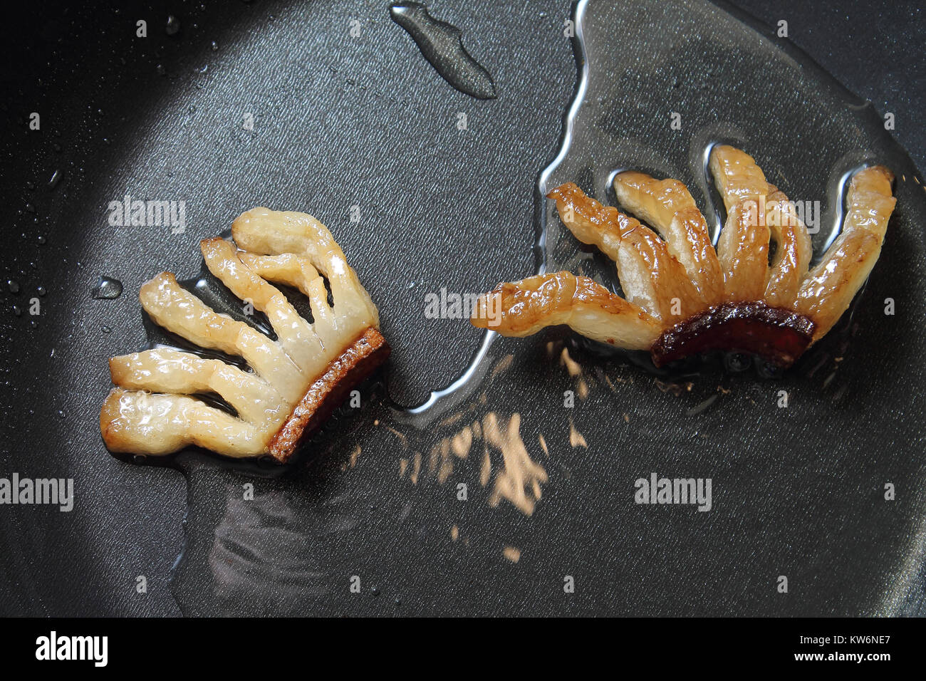 Melting fat - baking and cooking - grease bacon Stock Photo - Alamy