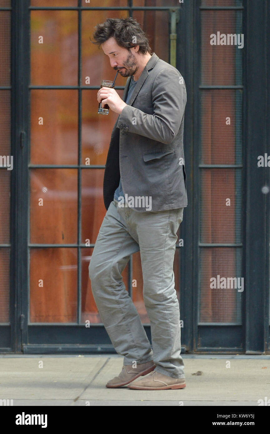 NEW YORK, NY - MAY 30: Keanu Reeves walking with a drink in downtown ...