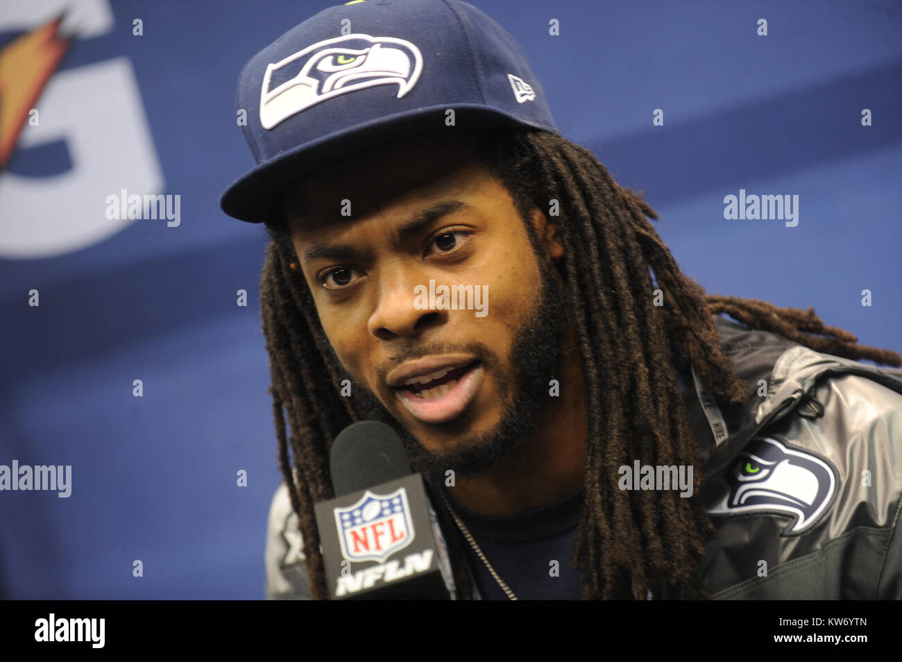 NEWARK, NJ - JANUARY 28: Richard Sherman speaks to the media during ...