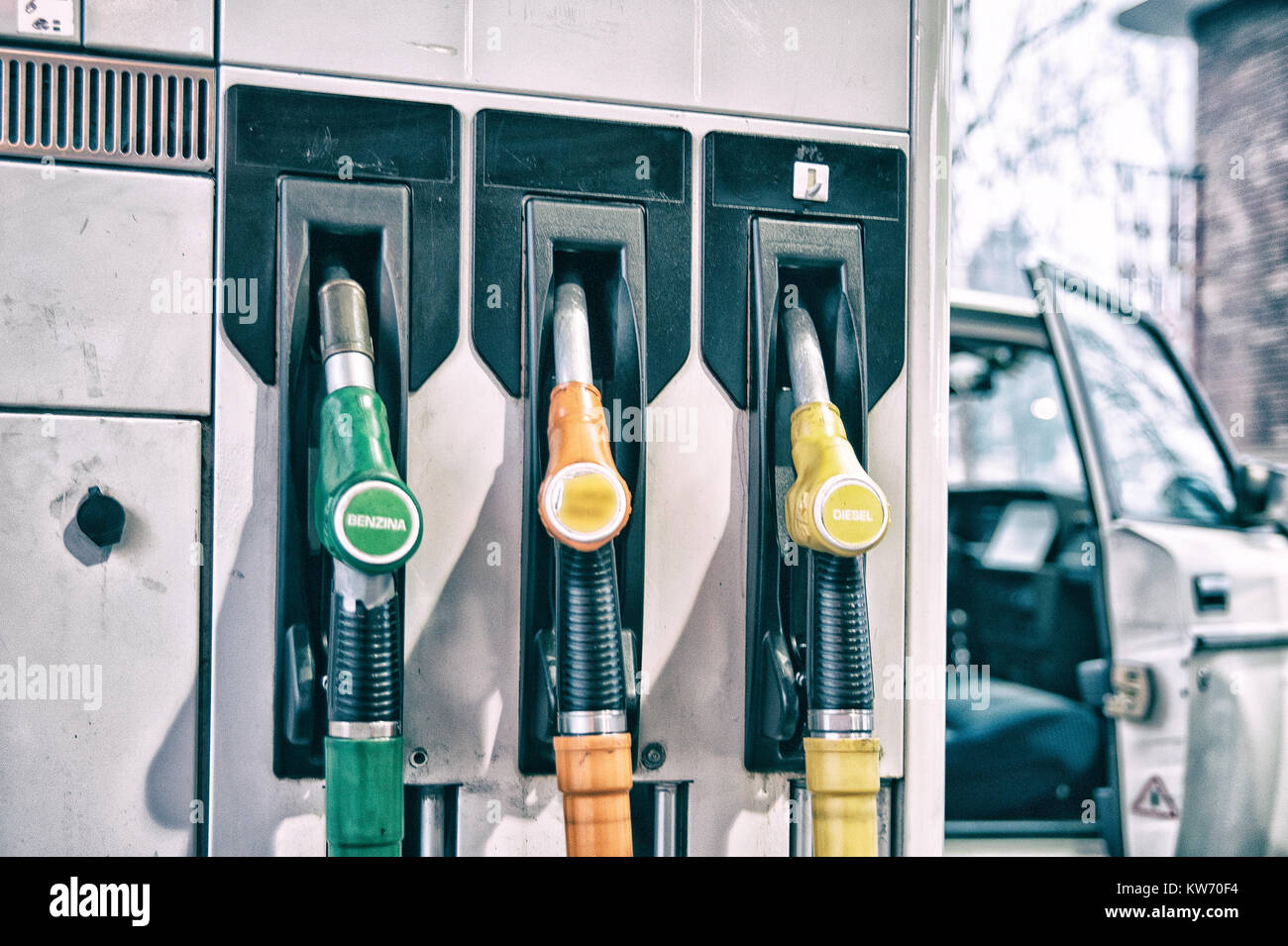 Gas station - car in the background Stock Photo - Alamy