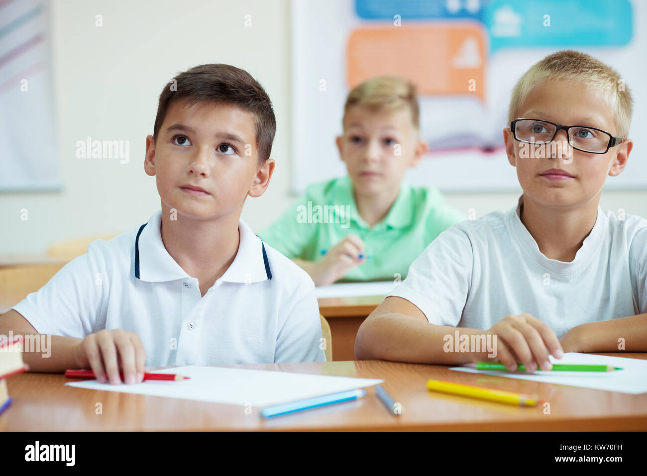 Portrait of children in shool at the lesson Stock Photo - Alamy