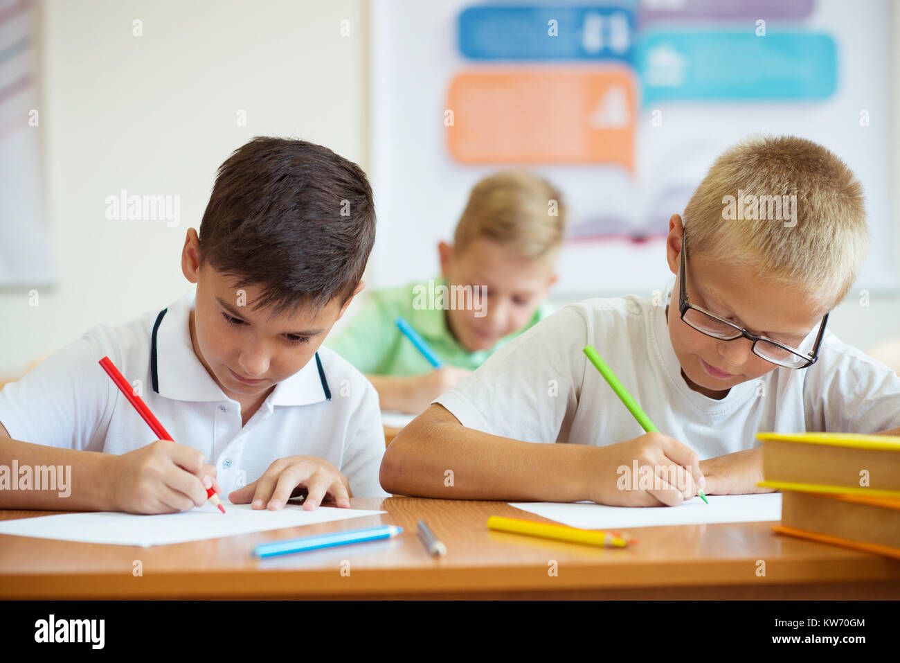 Portrait of children in shool at the lesson Stock Photo - Alamy