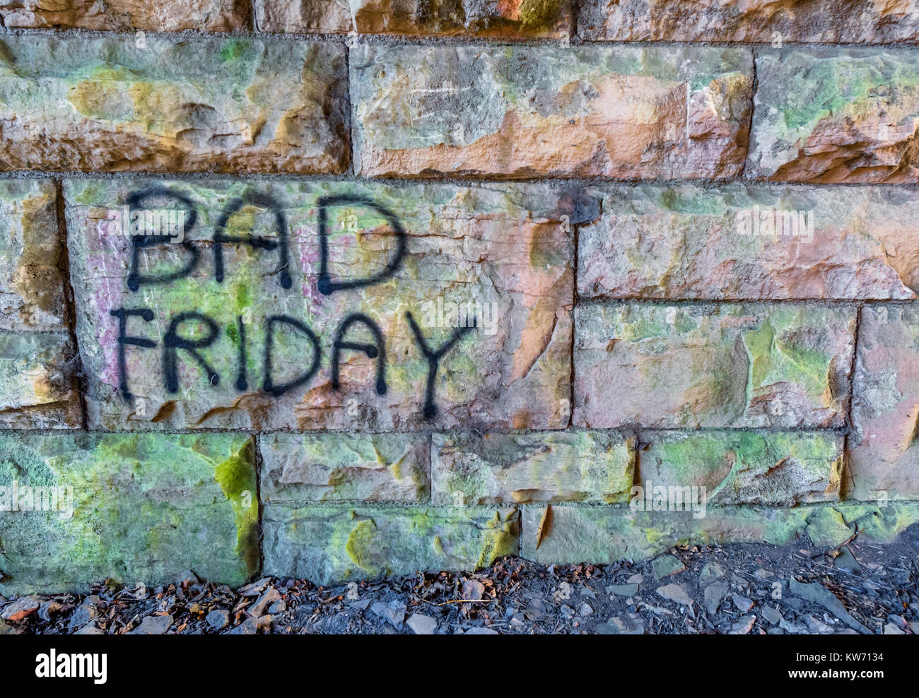 Bad Friday sprayed onto a stone wall Stock Photo - Alamy