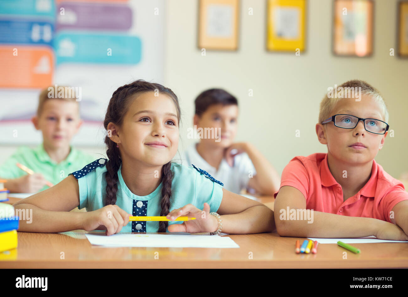 Portrait of children in shool at the lesson Stock Photo - Alamy