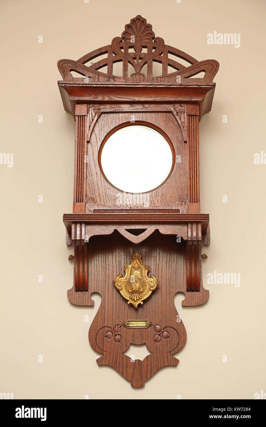 Antique Clock With Pendulum at Wall Stock Photo - Alamy